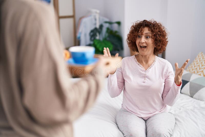 Two Women Mother and Daughter Surprise with Breakfast Stock Photo ...