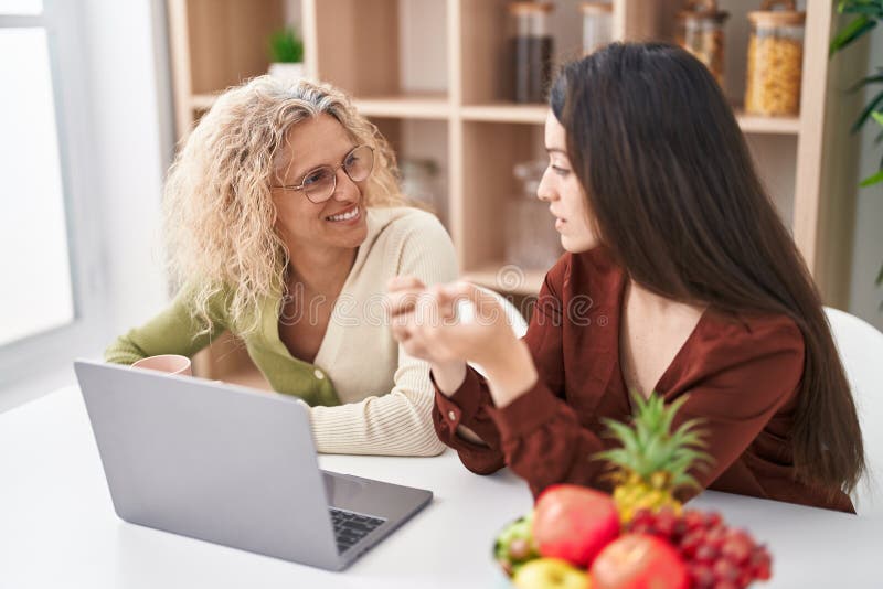 Two Women Mother and Daughter Using Laptop at Home Stock Image - Image ...
