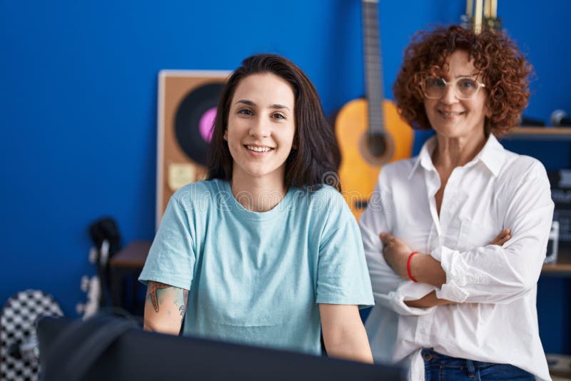 Two Women Musicians Smiling Confident at Music Studio Stock Photo ...