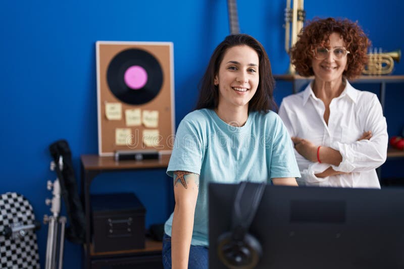 Two Women Musicians Smiling Confident at Music Studio Stock Image ...