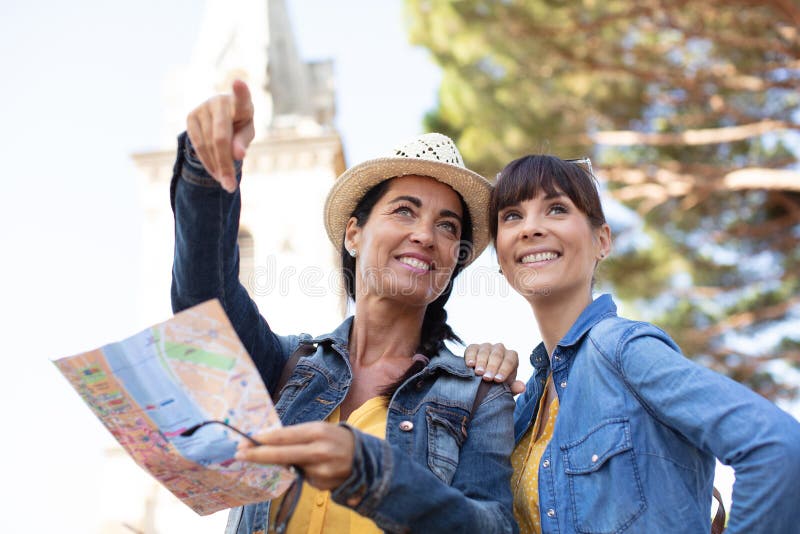 Two women sight seeing stock image. Image of ladies - 262493687