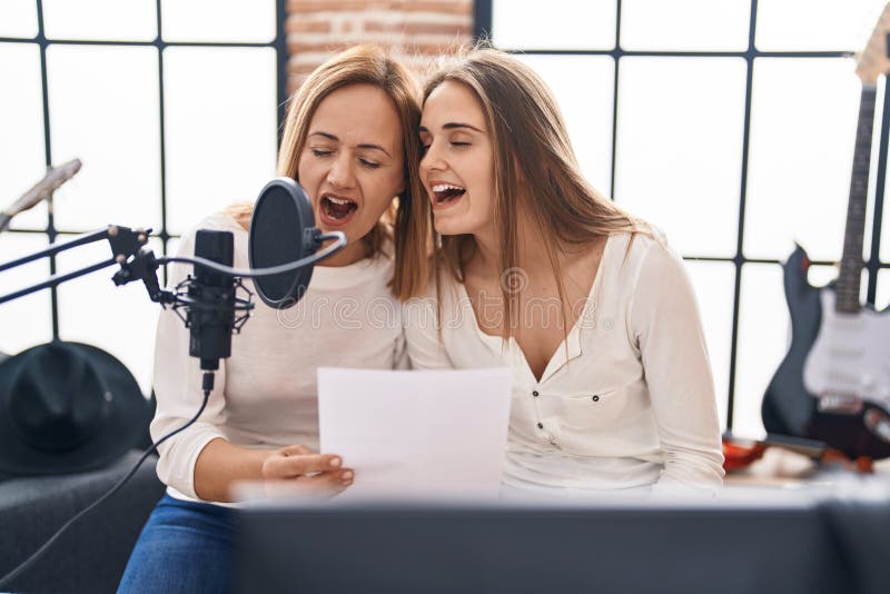 Two Women Singers Singing Song at Music Studio Stock Photo - Image of ...