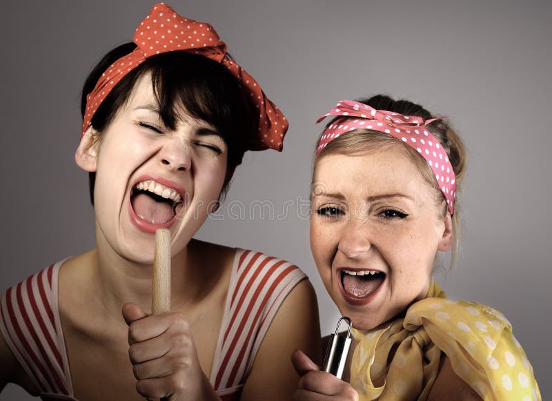 Two Women Singing Together. Stock Photo - Image of caucasian, color ...