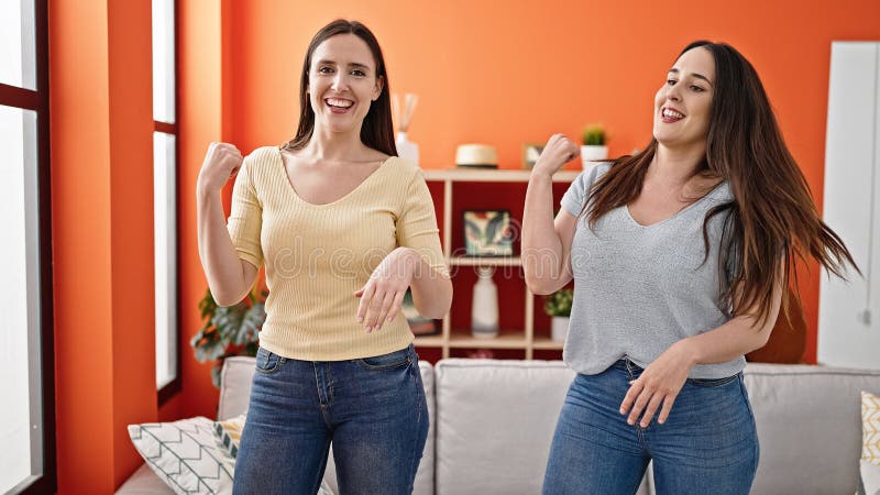Two Women Smiling Confident Dancing at Home Stock Image - Image of ...
