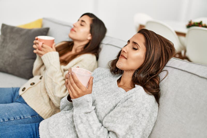 Two Women Smiling Confident Drinking Coffee at Home Stock Image - Image ...