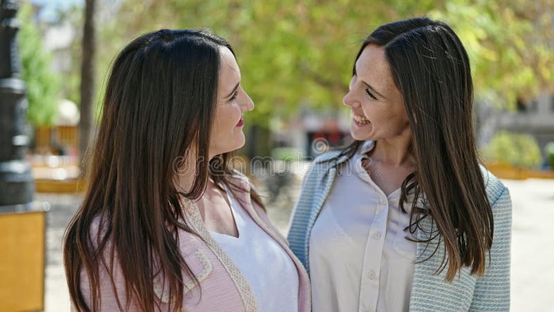 Two Women Smiling Confident Standing Together at Park Stock Footage ...