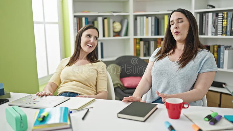 Two Women Students Finishing To Study at Library University Stock Video ...
