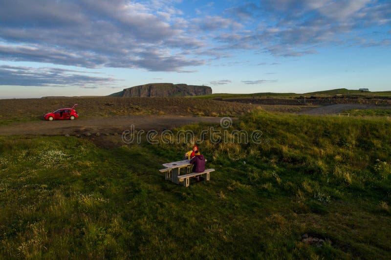 Two Women Tourists Sitting at the Table in Iceland Stock Photo - Image ...