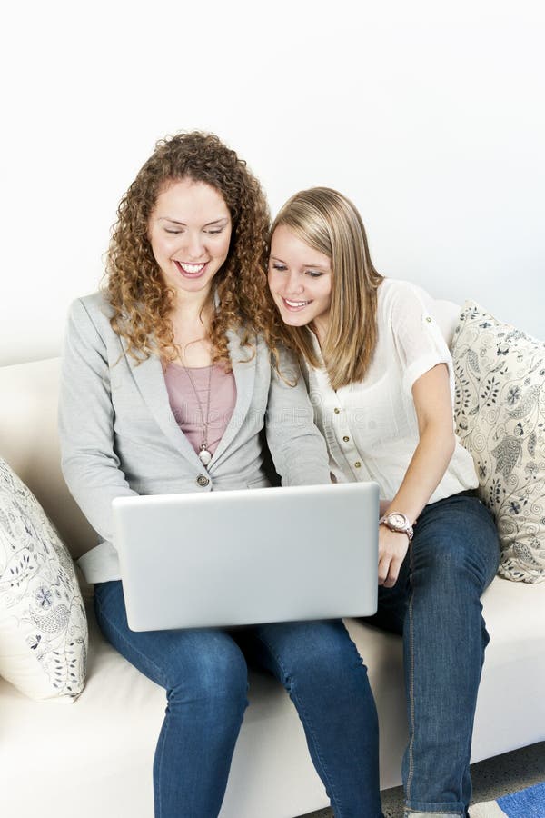 Two Women Using Laptop Computer Stock Image - Image of browsing, home ...