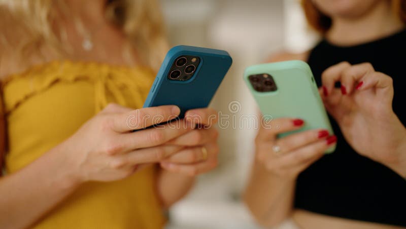 Two Women Using Smartphone Standing at Home Stock Image - Image of ...