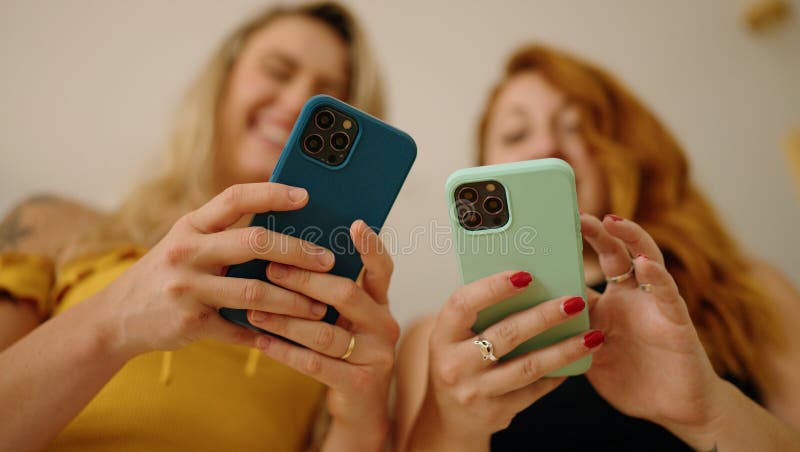 Two Women Using Smartphones Standing at Home Stock Image - Image of ...
