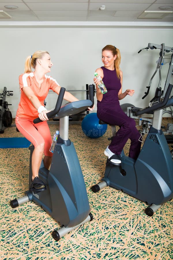 Two Women Working Out stock image. Image of indoors, caucasian - 14065795