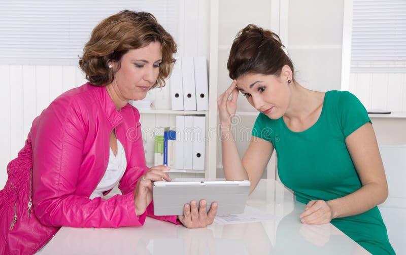 Two Women Working Together at Office with Tablet-pc. Stock Image ...