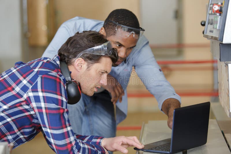 Two Wood Designer Working with Laptop in Workshop Stock Photo - Image ...