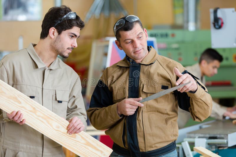 Two Wood Designer Working with Laptop in Workshop Stock Photo - Image ...