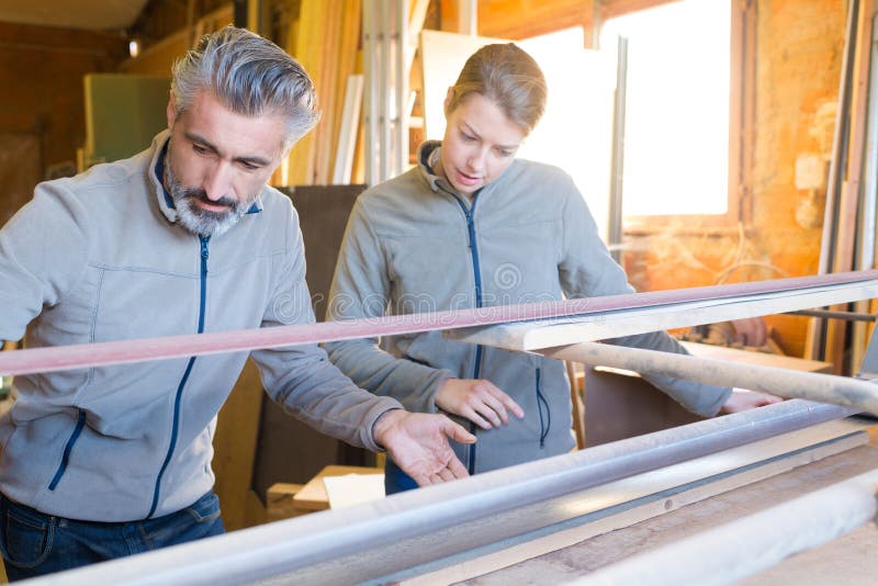 Two Wood Workers in Carpentry Stock Image - Image of control, female ...
