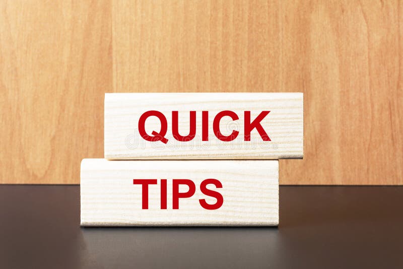 Two Wooden Blocks with the Text QUICK TIPS on a Light Wooden Background ...