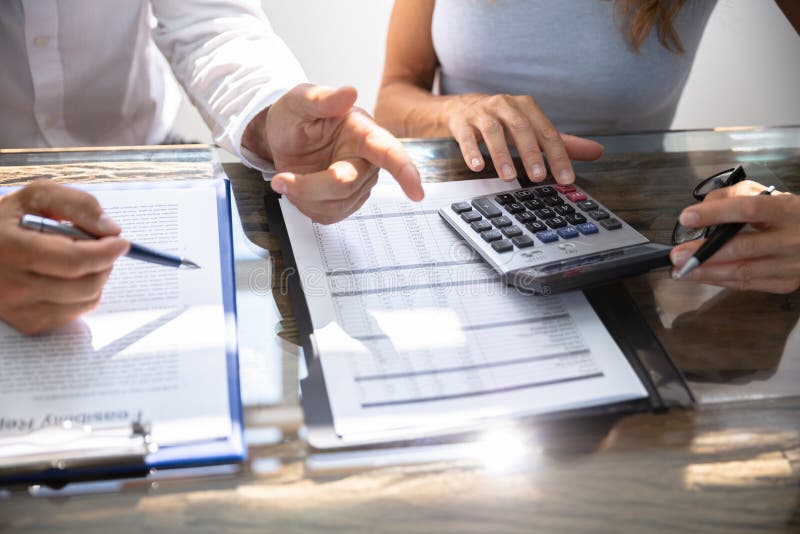 Two Worker Calculating Report in Office Stock Image - Image of data ...