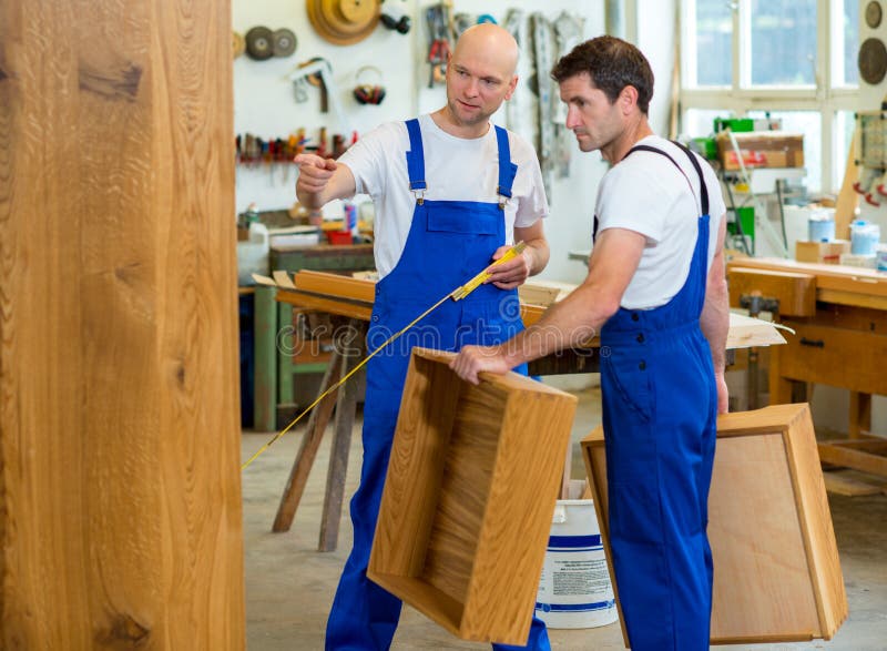 Two Worker in a Carpenter S Workshop Stock Photo - Image of ...