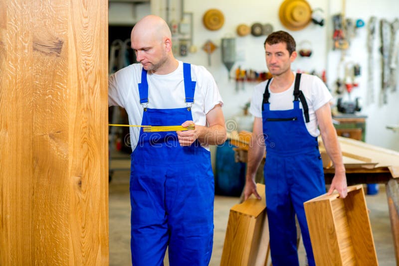 Two Worker in a Carpenter S Workshop Stock Image - Image of carpenter ...