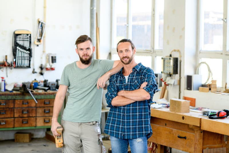 Two Worker in a Carpenters Workshop Stock Photo - Image of earmuffs ...