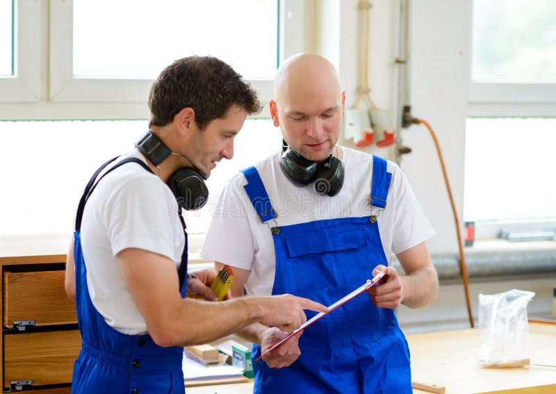 Two Worker in a Carpenter S Workshop Stock Photo - Image of production ...