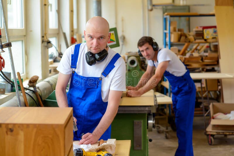 Two Worker in a Carpenter S Workshop Stock Image - Image of workplace ...