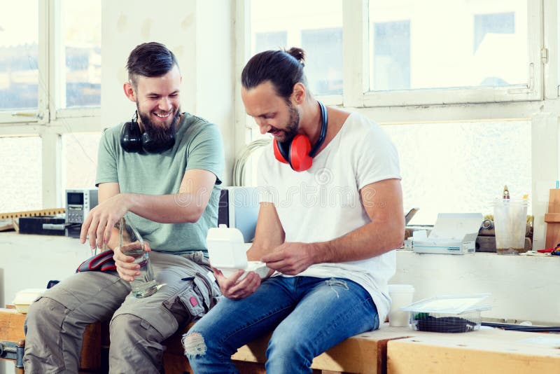 Two Worker in a Carpenter`s Workshop Taking a Break Stock Image - Image ...