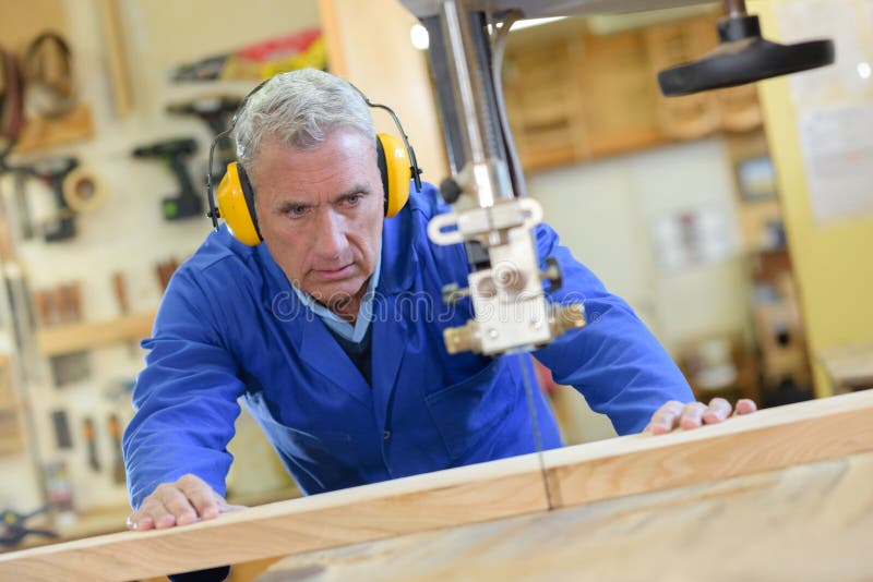Two Worker in Carpenters Workshop Using Saw Machine Stock Image - Image ...
