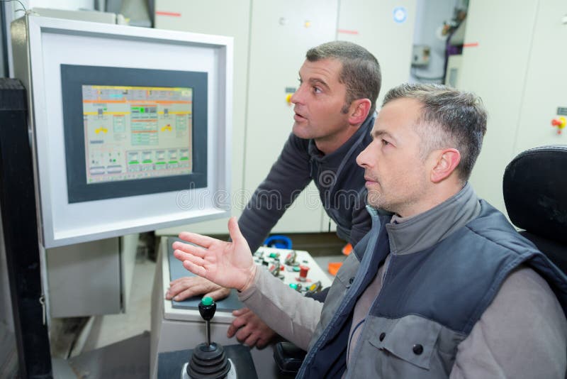 Two Worker in Factory Checking Machine Stock Image - Image of ...