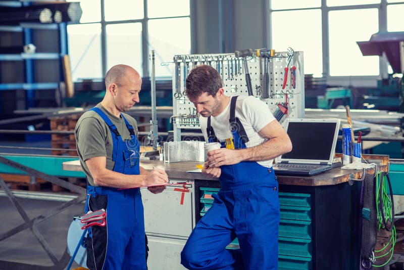 Two Worker in Factory in Conversation Stock Image - Image of industrial ...
