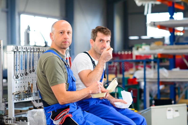Two Worker in Factory Have a Break Stock Image - Image of engineer ...