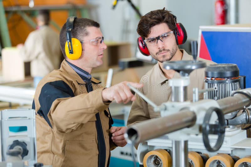 Two Worker in Factory on Machine Stock Image - Image of male, handyman ...