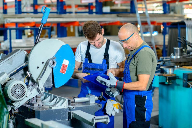 Two worker in factory stock photo. Image of cheerful - 82232380