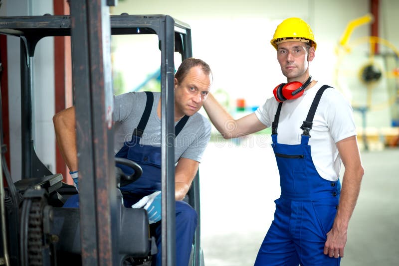 Two worker in factory stock photo. Image of manufacturing - 47053664