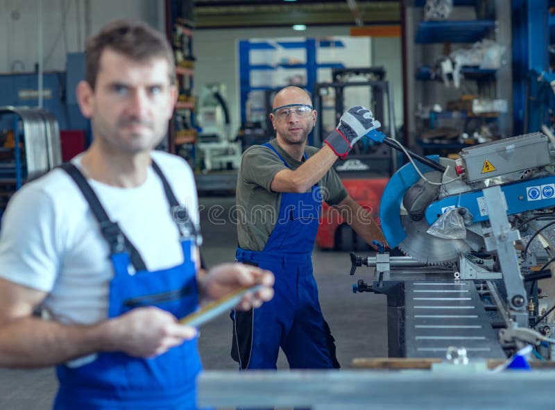 Two worker in factory stock image. Image of business - 144730189