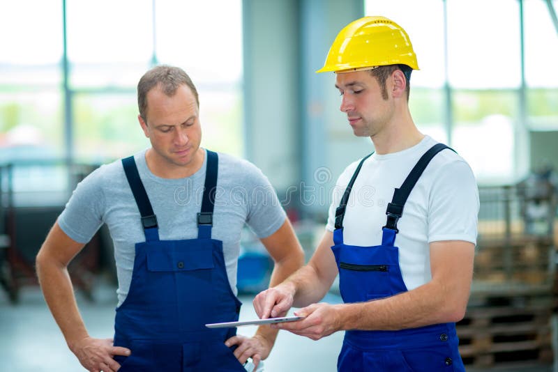 Two Worker in Factory Using Tablet Pc Stock Image - Image of operator ...