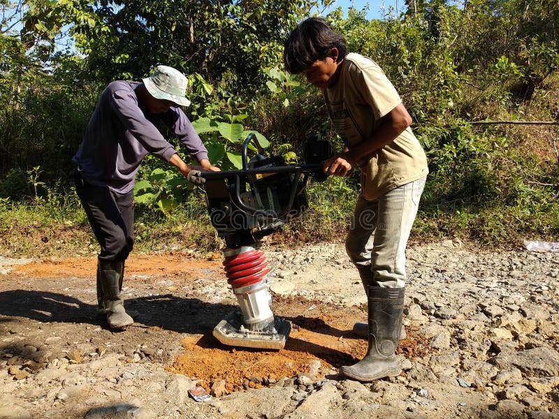 Two Worker Repairing the Road Editorial Stock Image - Image of together ...
