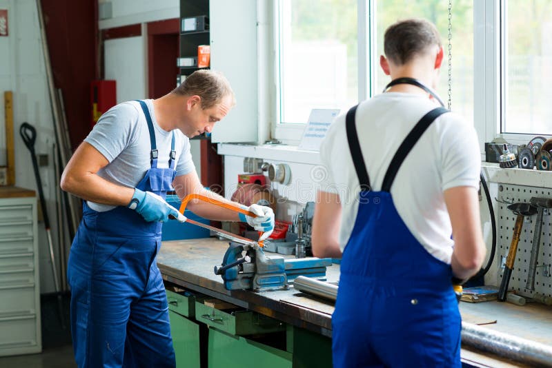 Two Worker on Work Bench in Factory Stock Image - Image of metal ...