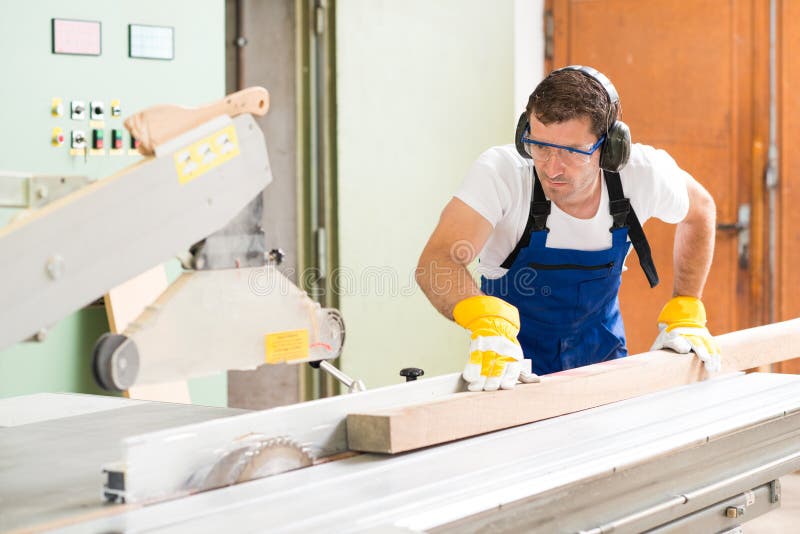 Two Worker in Workshop Using Saw Machine Stock Photo - Image of ...