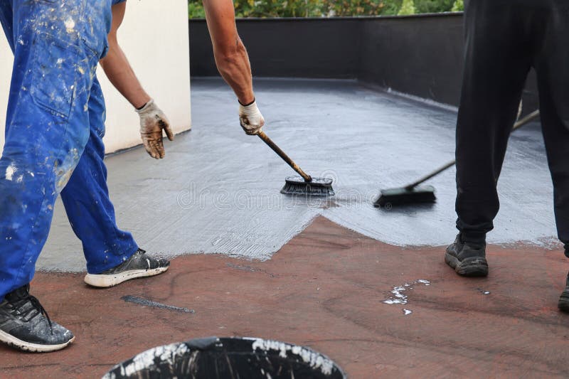 Two Workers Applying a Roof Waterproofing Stock Image - Image of ...