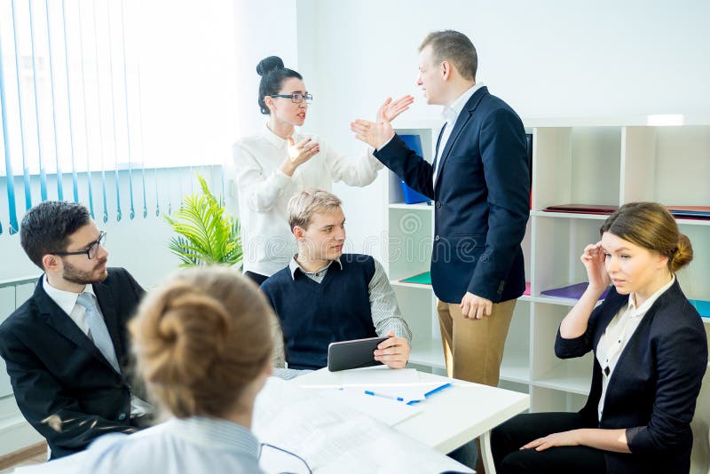 Two workers argue stock photo. Image of confident, shouting - 89760236