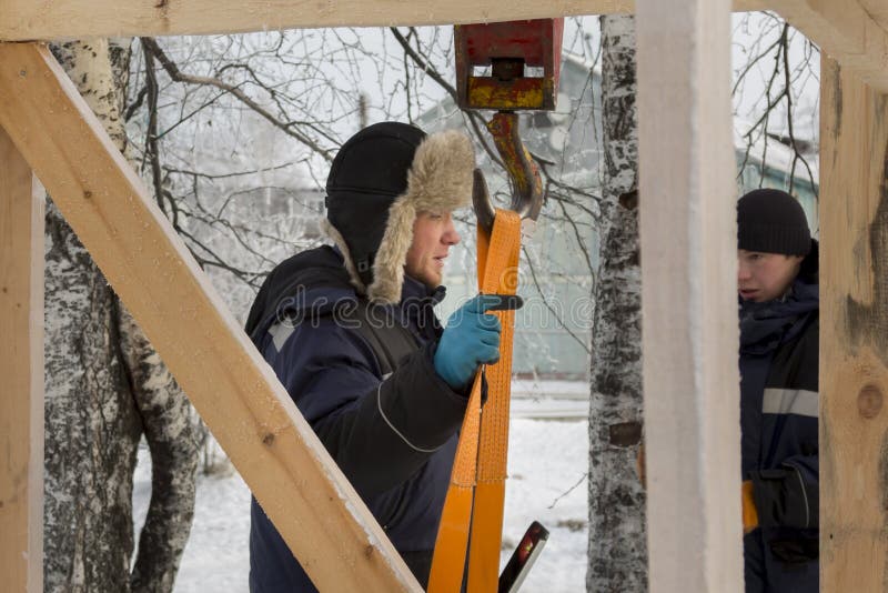 Workers Assembling the Frame of a Wooden Slide Stock Image - Image of ...