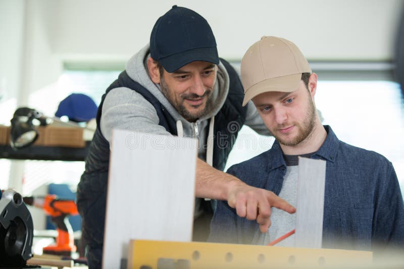 Two Workers in Carpenters Workshop Stock Image - Image of professional ...