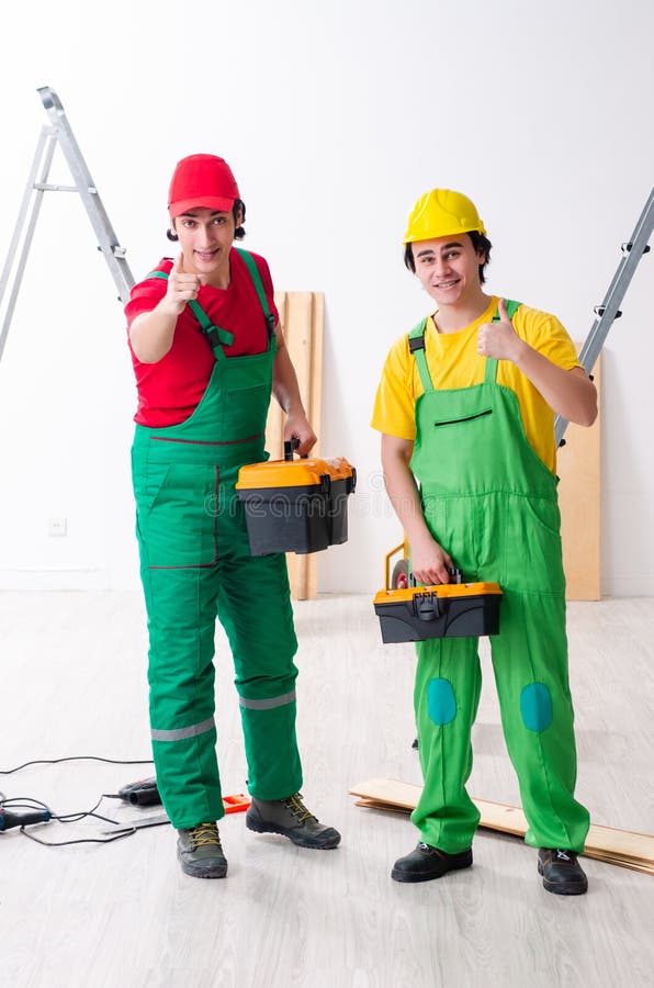 Two Workers Contractors Working Indoors Stock Photo - Image of ...