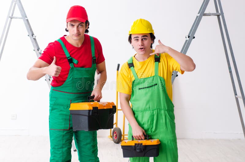 Two Workers Contractors Working Indoors Stock Image - Image of plank ...