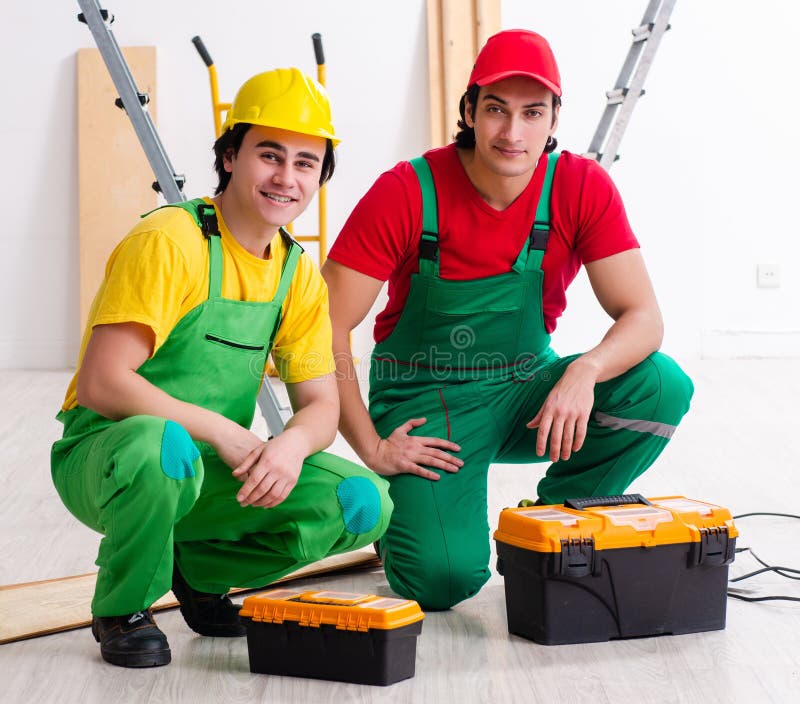 Two Workers Contractors Working Indoors Stock Image - Image of foreman ...