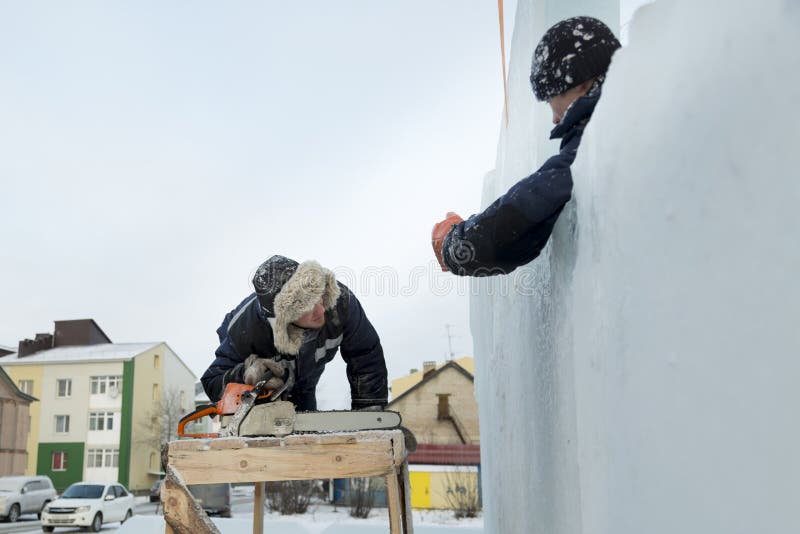 Workers are Assembling Ice Blocks on the Frame of a Wooden Slide Stock ...