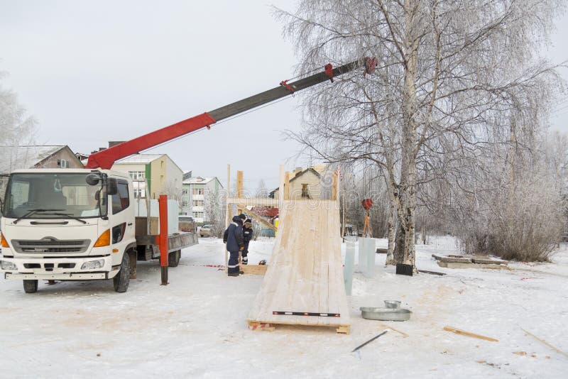 Workers are Assembling Ice Blocks on the Frame of a Wooden Slide Stock ...