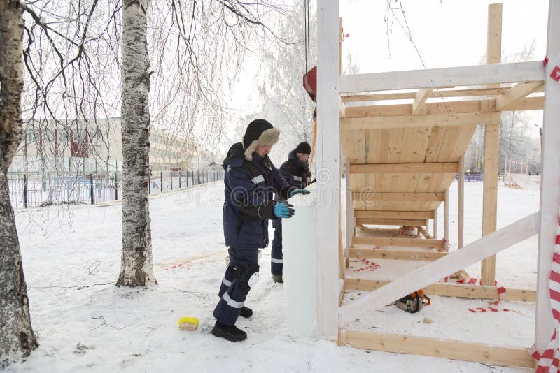 Workers are Assembling Ice Blocks on the Frame of a Wooden Slide Stock ...